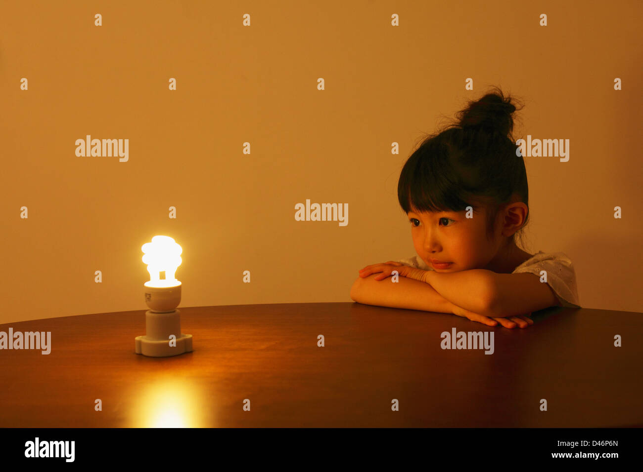 Girl Looking at Light Stock Photo - Alamy