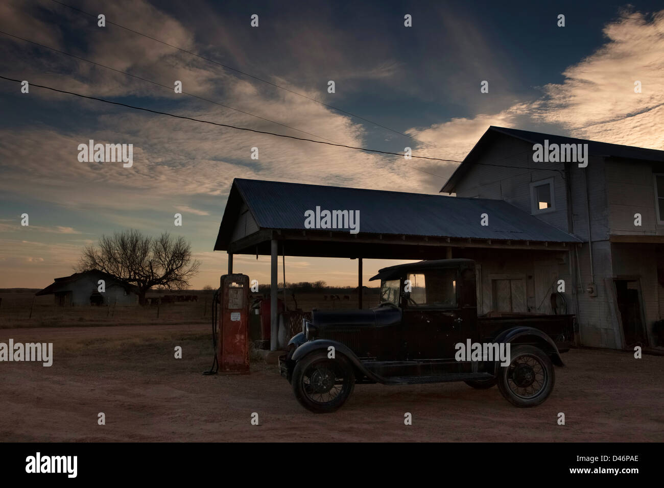 Old Model T Farm Truck and Windmill on a farm in Texas, USA Stock Photo ...
