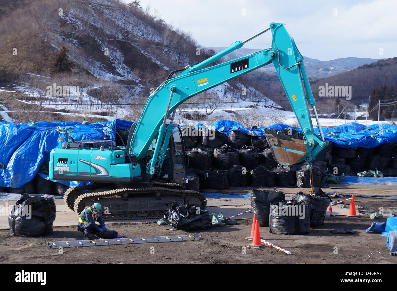 A digger stands in a nuclear waste disposal facility near the 20 ...