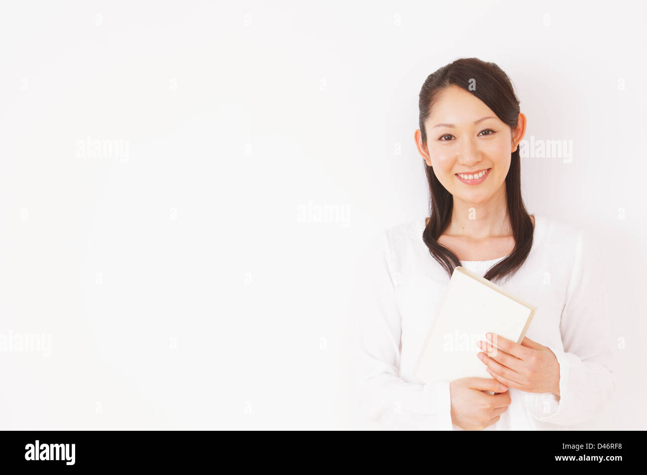 Woman With a Book Stock Photo - Alamy