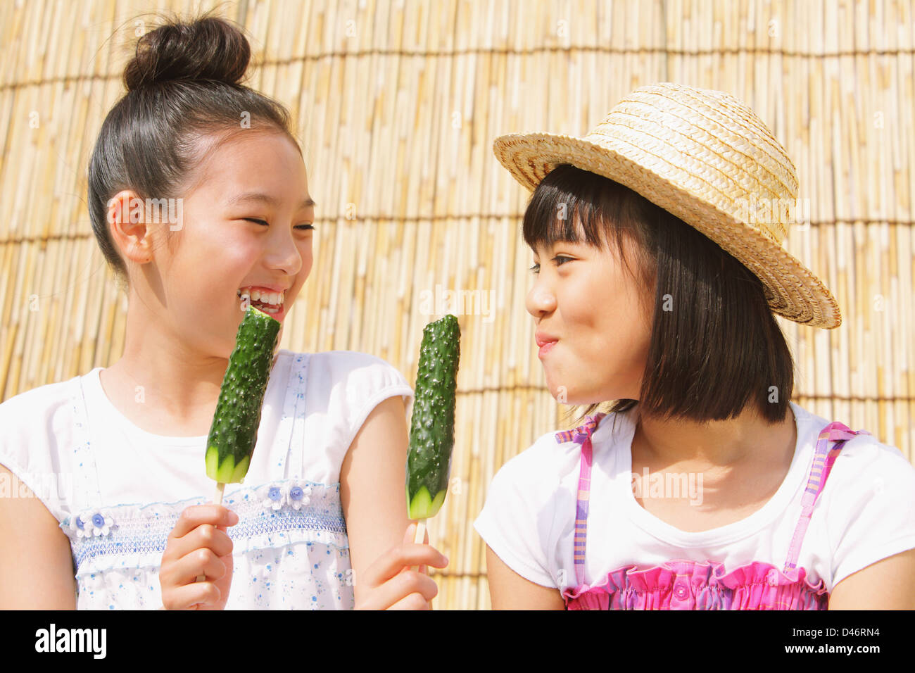 Children Eating Cucumbers Stock Photo - Alamy