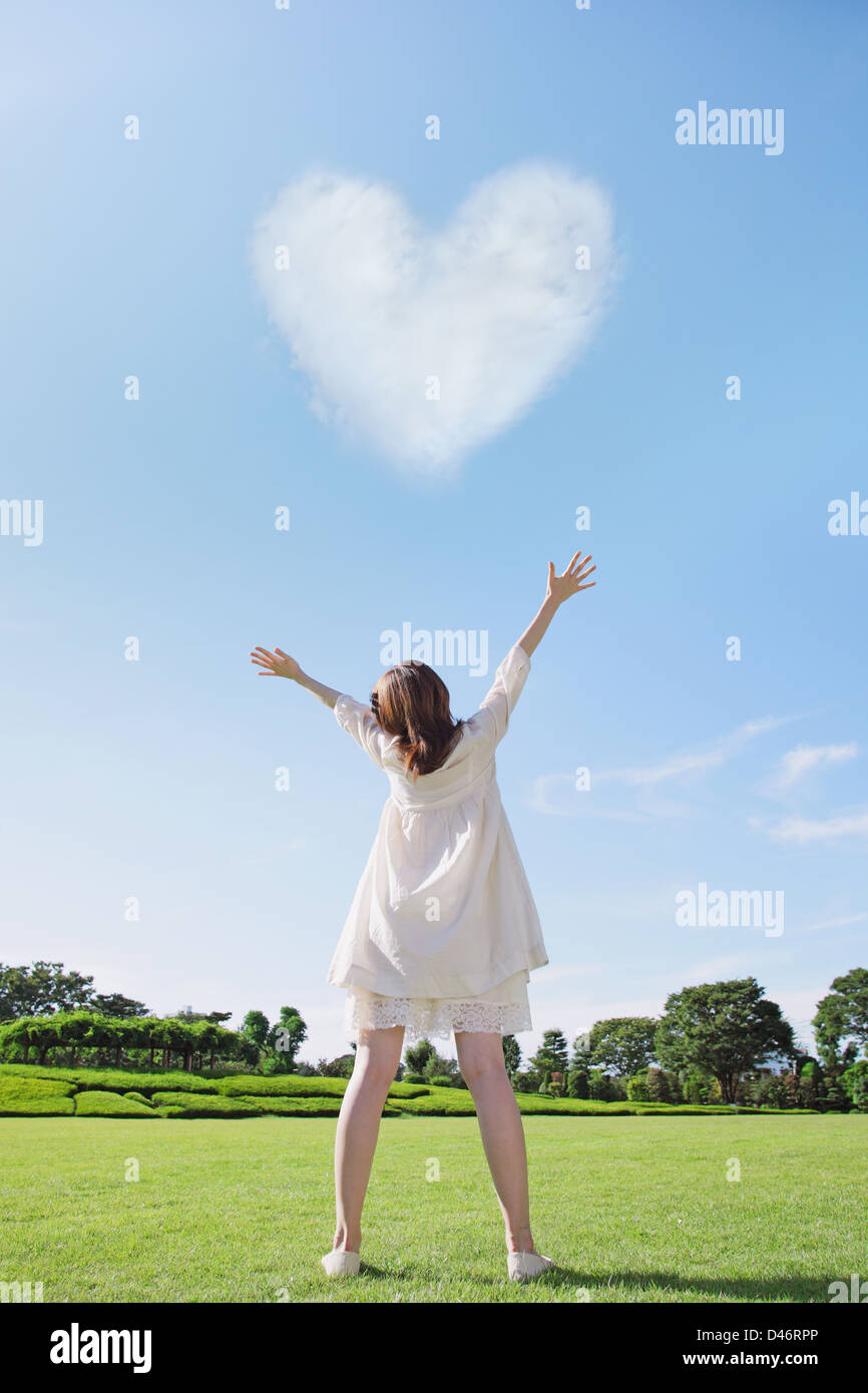Woman Looking at the Sky Stock Photo - Alamy