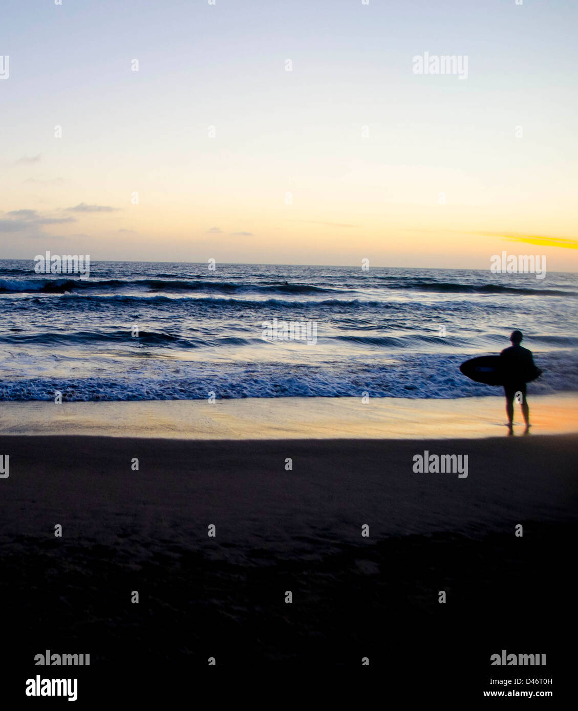 surfer at sunset Stock Photo - Alamy