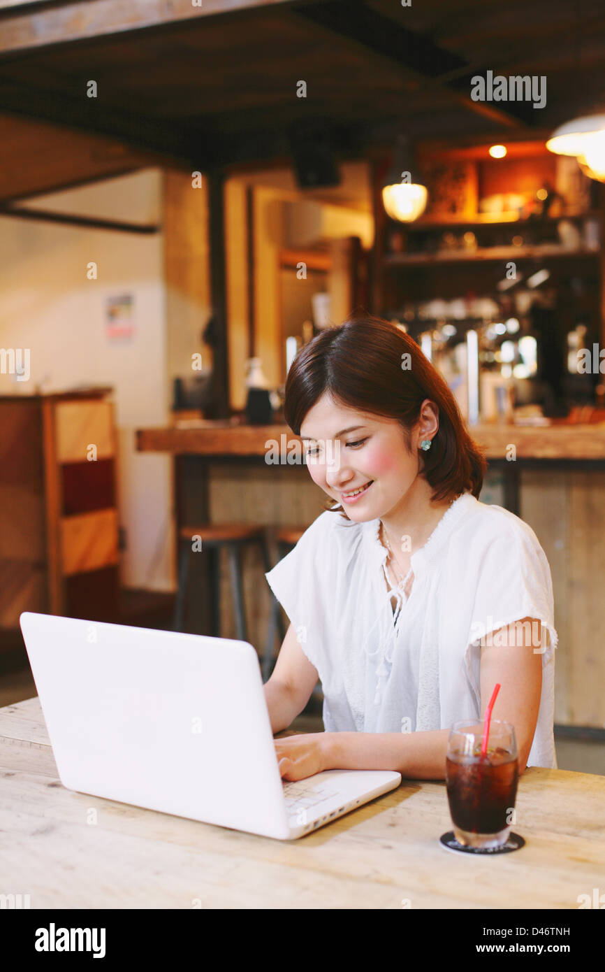 Woman Relaxing In a Cafe Stock Photo - Alamy