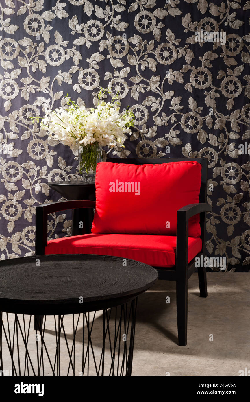 Black red Chair furniture with elegant wall decoration Stock Photo - Alamy