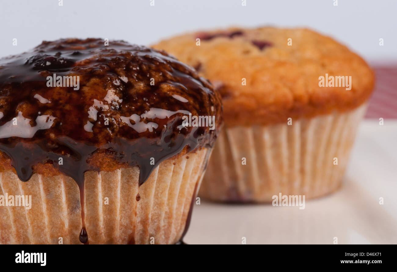 Two freshly baked homemade muffins Stock Photo - Alamy