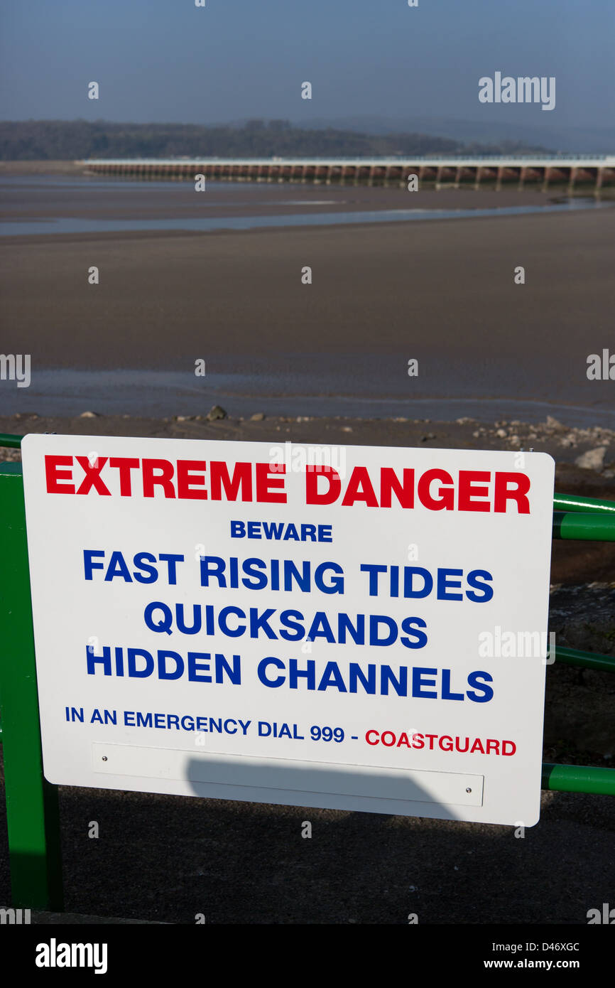 Warning sign at Arnside on Morecambe Bay, warning of fast rising tides ...