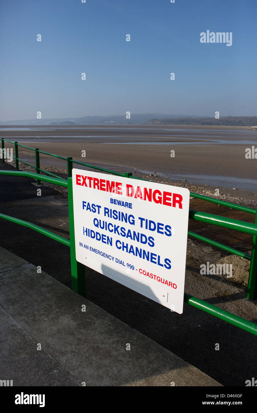 Warning sign at Arnside on Morecambe Bay, warning of fast rising tides ...