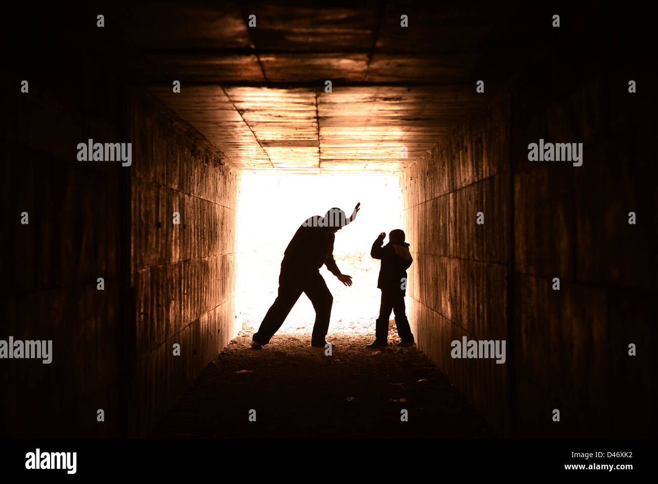 homeless man in the alley that compresses the bottom of the child Stock ...