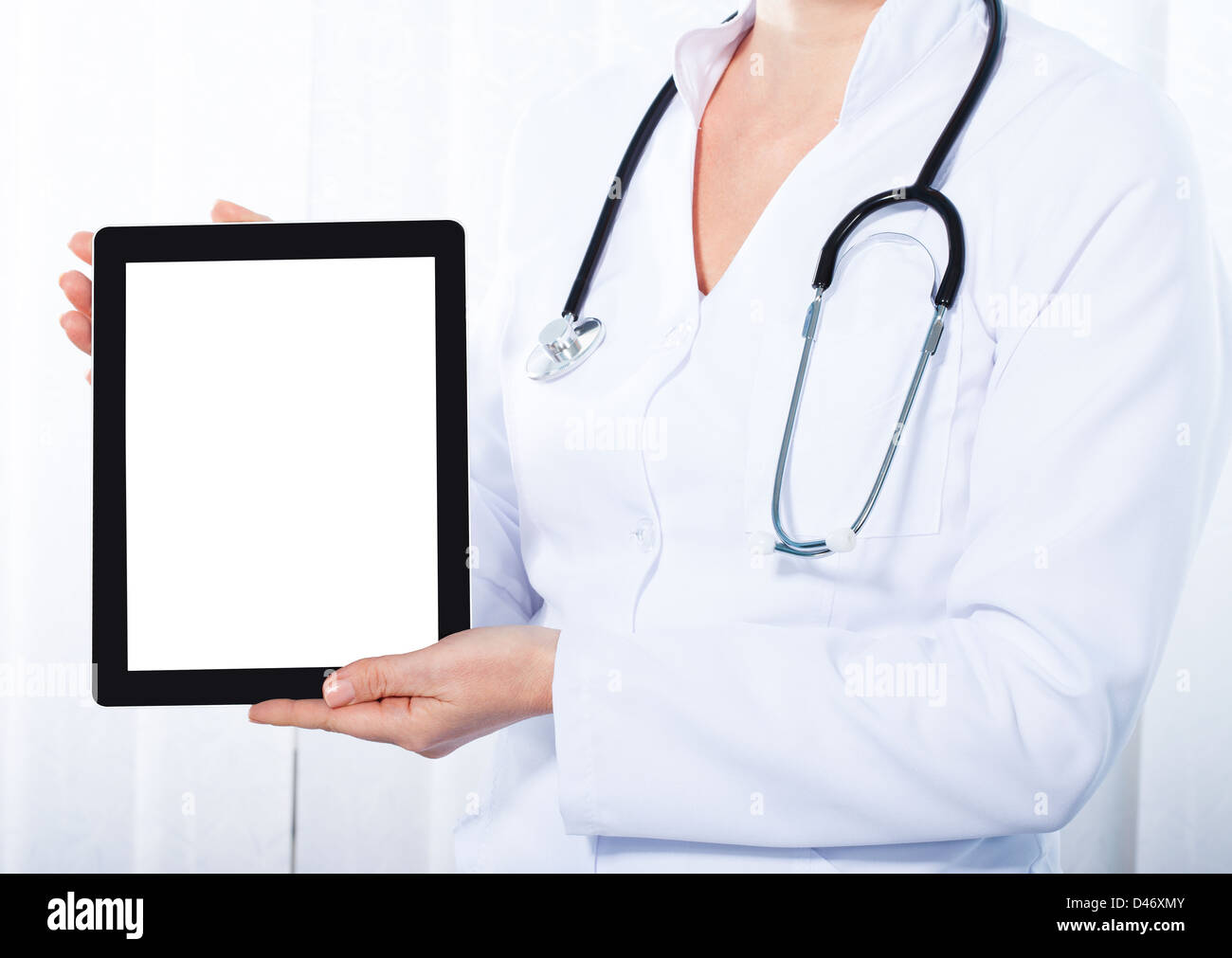 Woman doctor holding a tablet and makes diagnosis. Concept of medicine ...