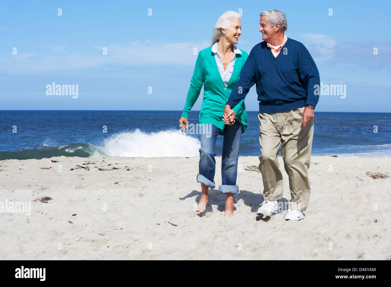 Walking along beach hi-res stock photography and images - Alamy