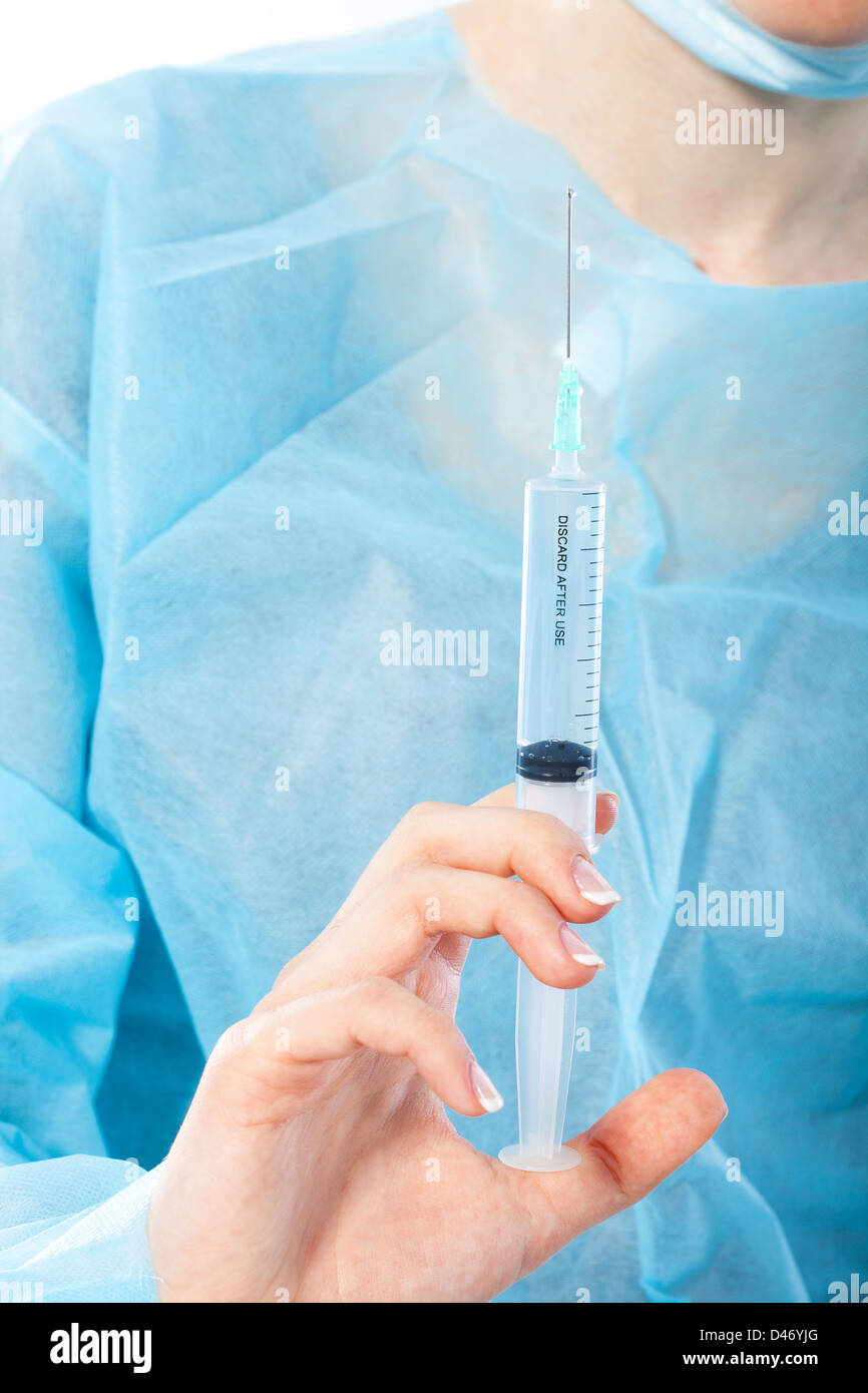 Portrait of woman doctor, surgeon with syringe. Closeup Stock Photo - Alamy