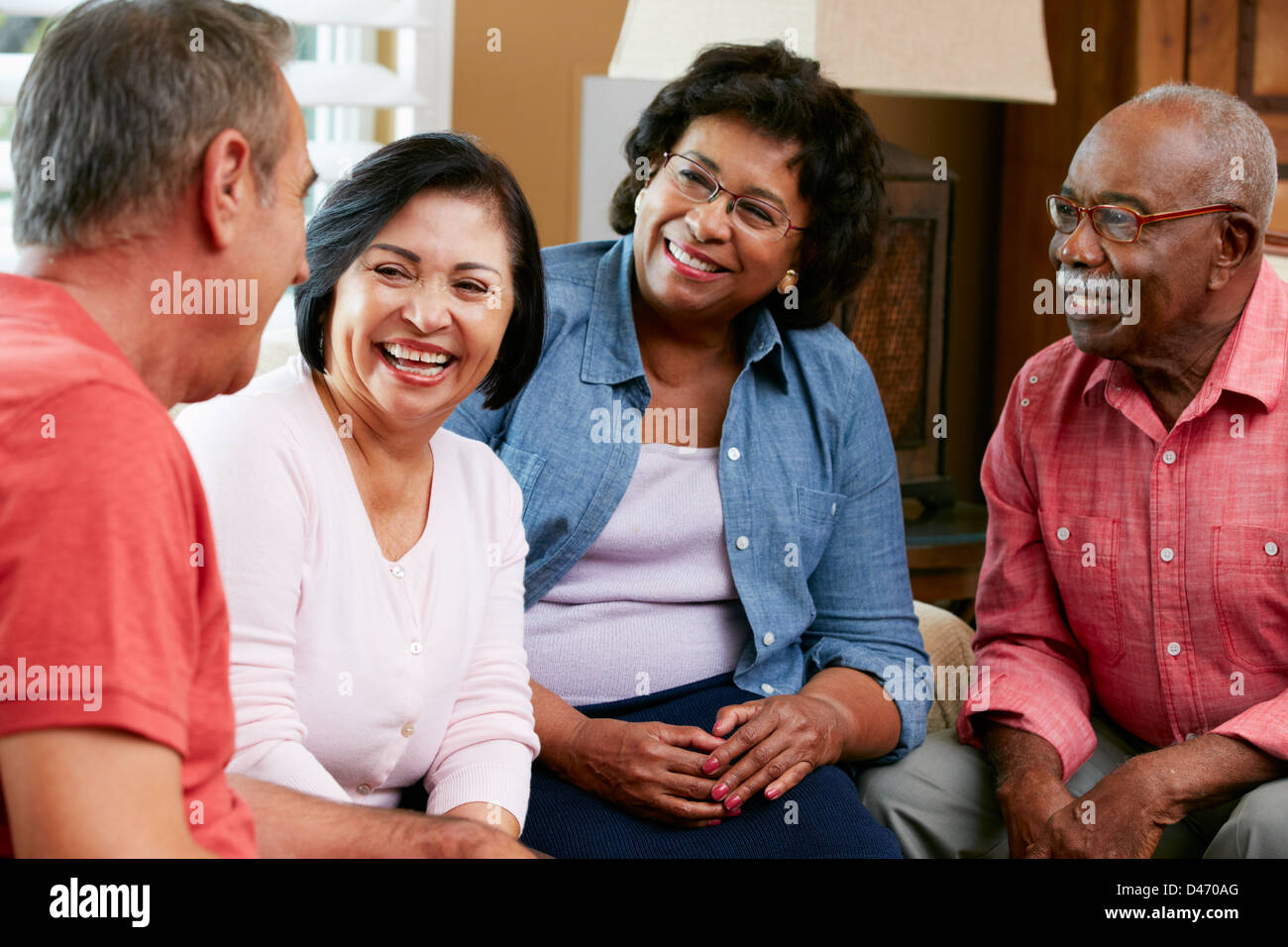 Group Of Senior Friends Chatting At Home Together Stock Photo - Alamy