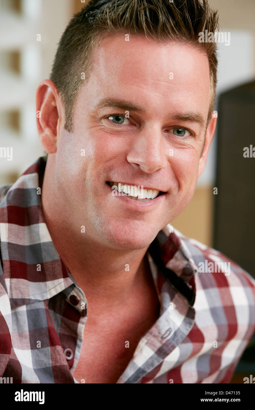 Portrait Of Smiling Man At Home Stock Photo - Alamy