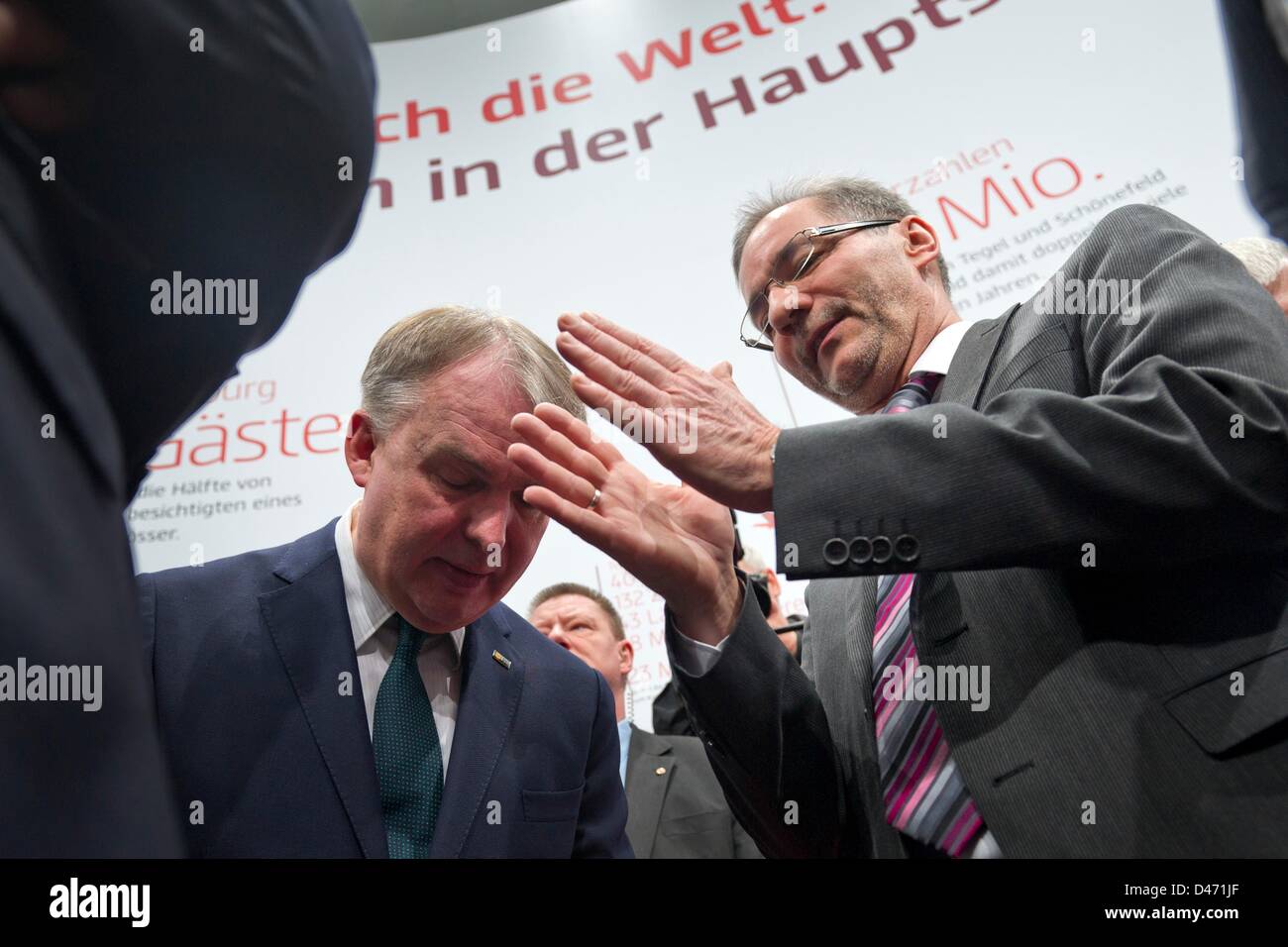 Premier of Brandenburg, Matthias Platzeck (R) speaks with Thomas Kropp ...