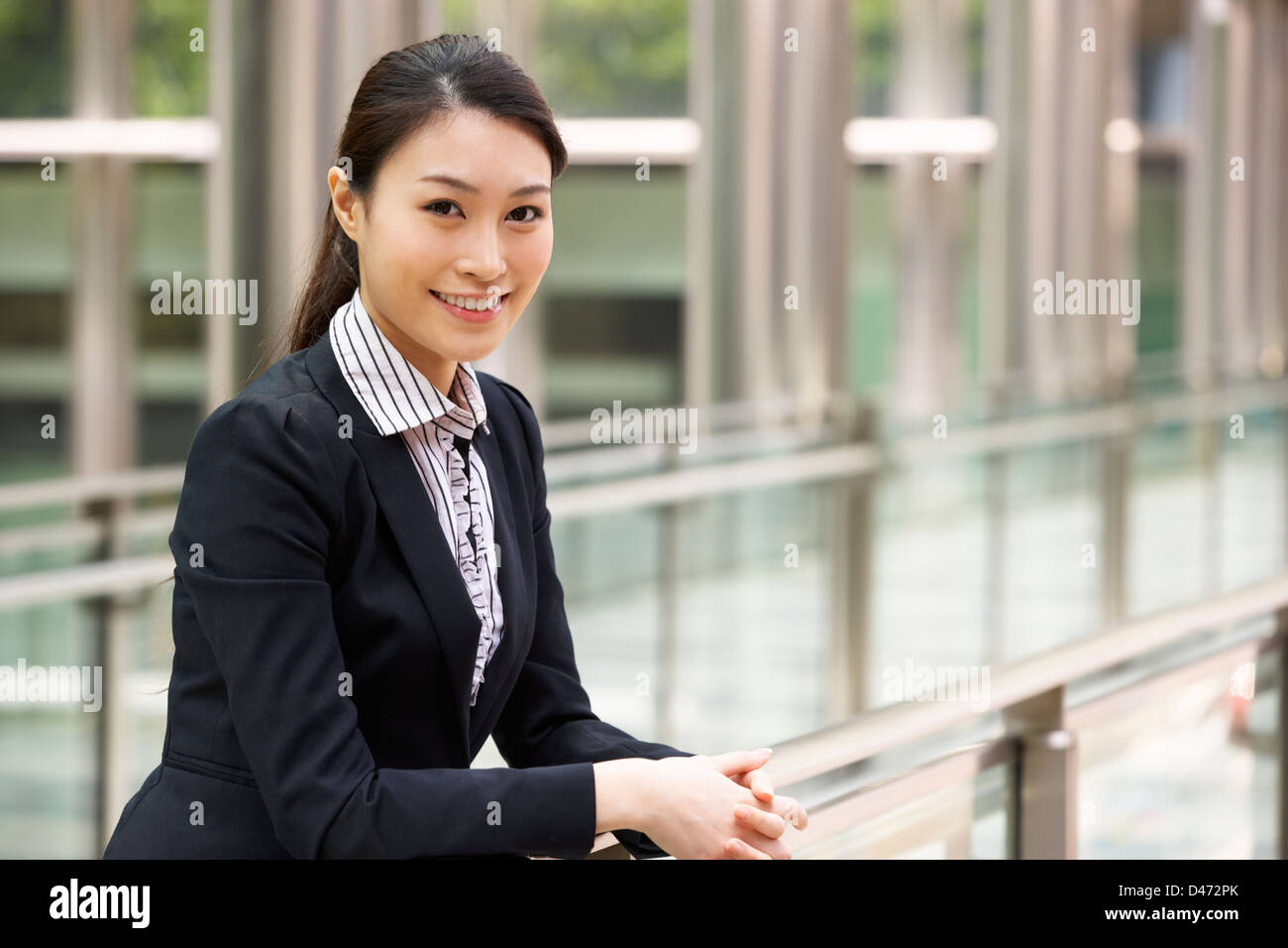 Portrait Of Chinese Businesswoman Outside Office Stock Photo - Alamy