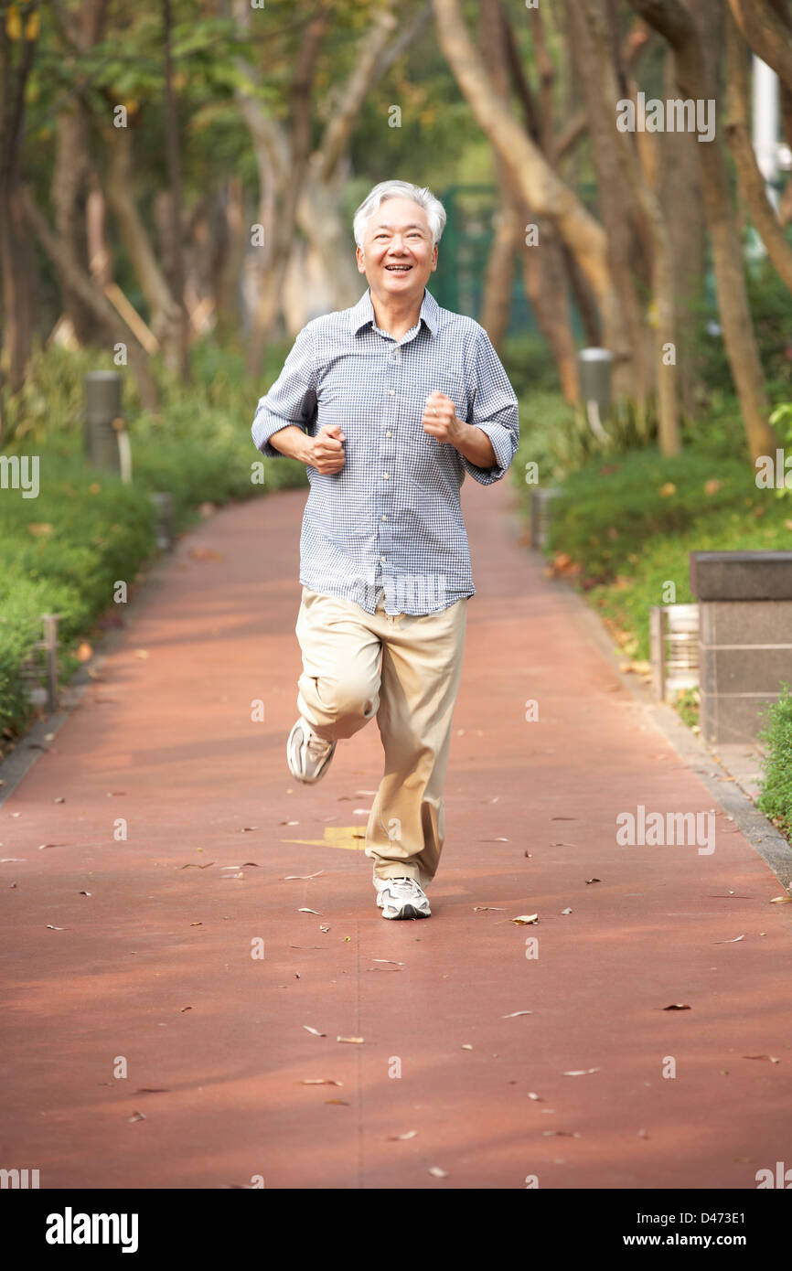 Senior chinese man jogging in hi-res stock photography and images - Alamy