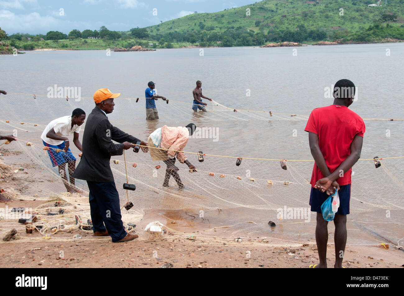 Hauling fishing nets hi-res stock photography and images - Alamy