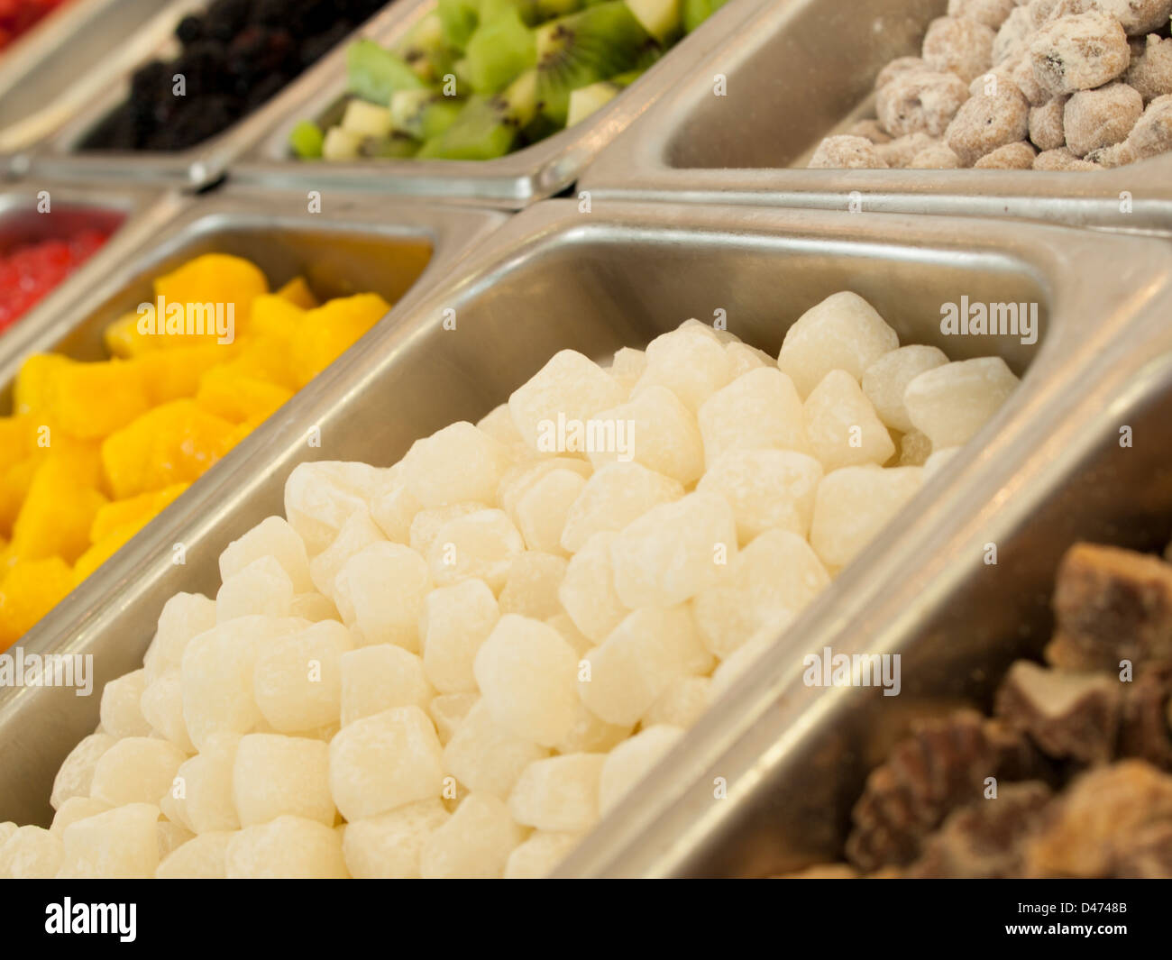 ‎Frozen yogurt toppings bar. Yogurt toppings ranging from fresh fruits ...