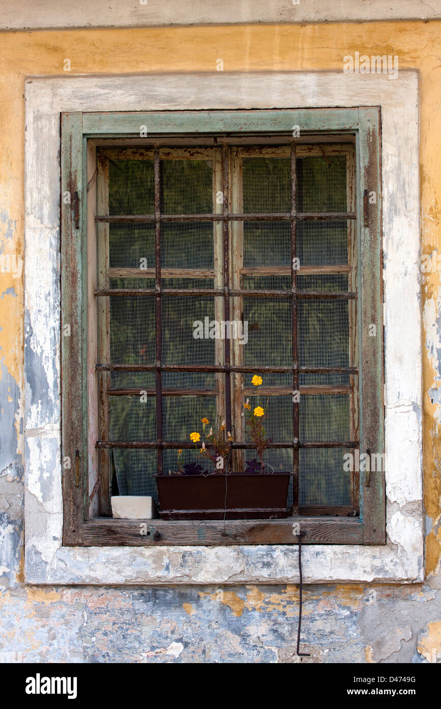 Window with bars on old house Stock Photo - Alamy