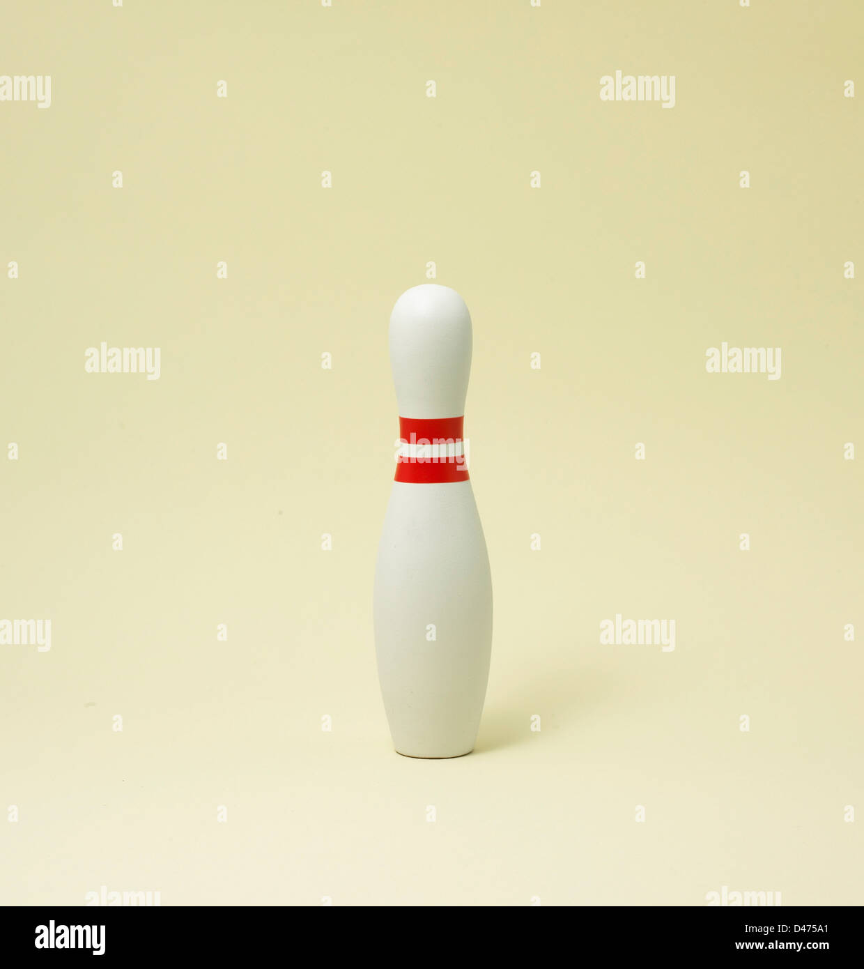 Single white and red skittle cut out white background Stock Photo - Alamy