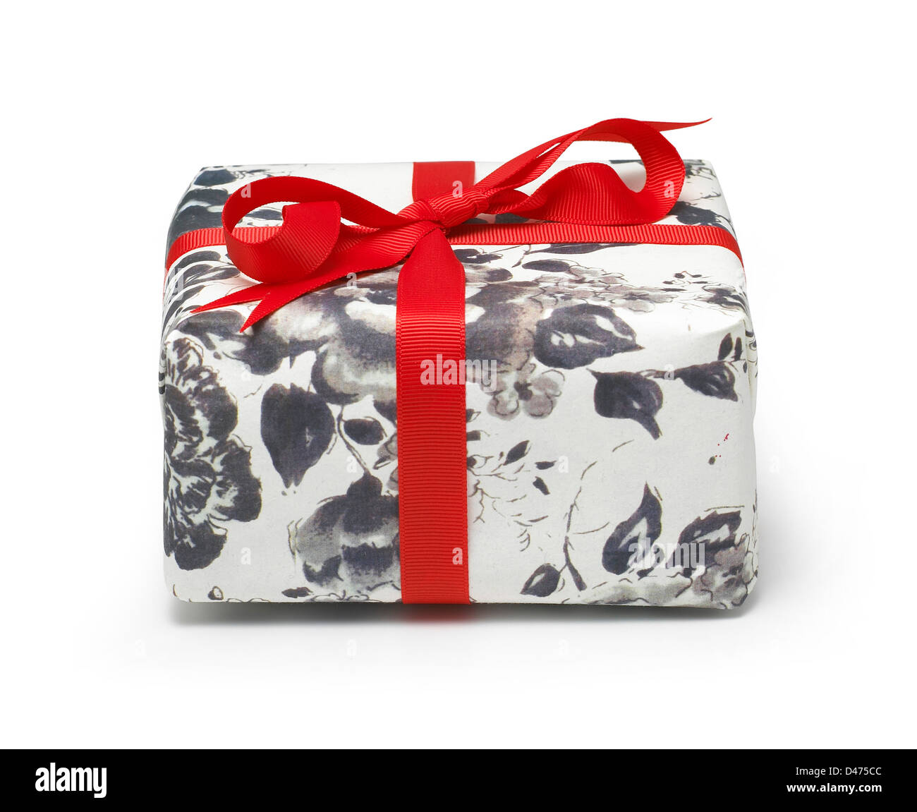 Wrapped black and white present with red ribbon cut out white ...