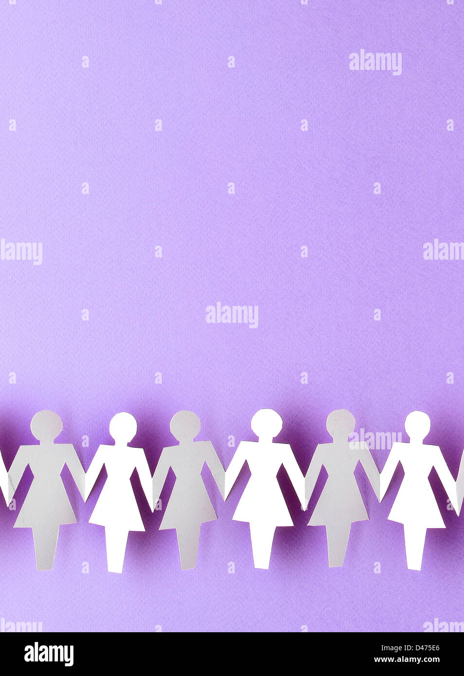 Paper chain cut out purple background Stock Photo - Alamy