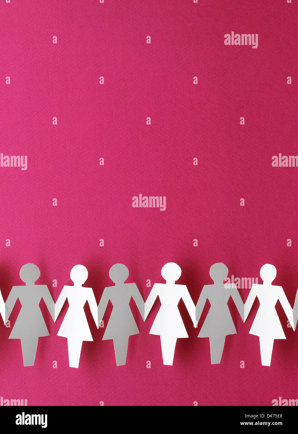 Paper chain cut out pink background Stock Photo - Alamy