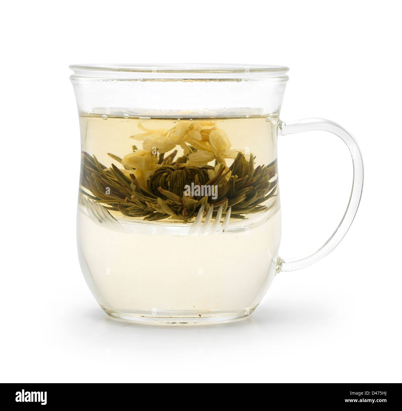 Clear glass of Jasmine tea cut out white background Stock Photo - Alamy
