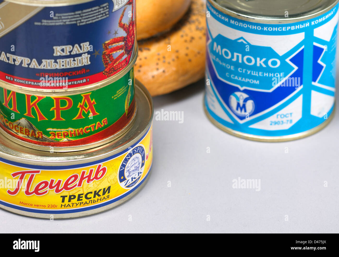 Tins of russian fish cut out white background Stock Photo - Alamy