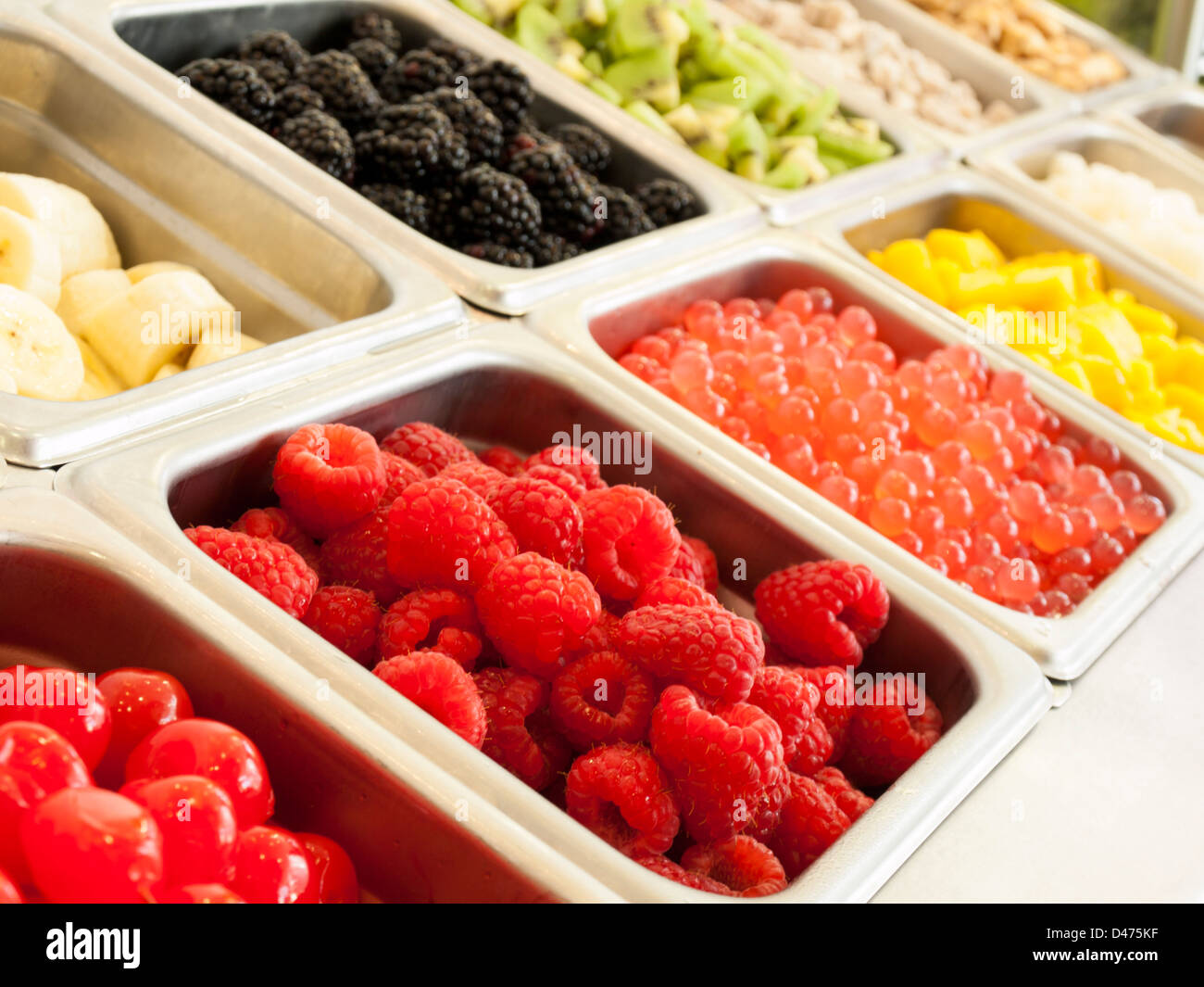 ‎Frozen yogurt toppings bar. Yogurt toppings ranging from fresh fruits ...
