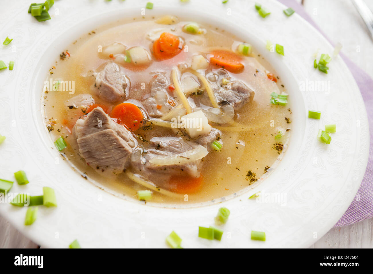 meat soup with noodles and vegetables, closeup Stock Photo - Alamy