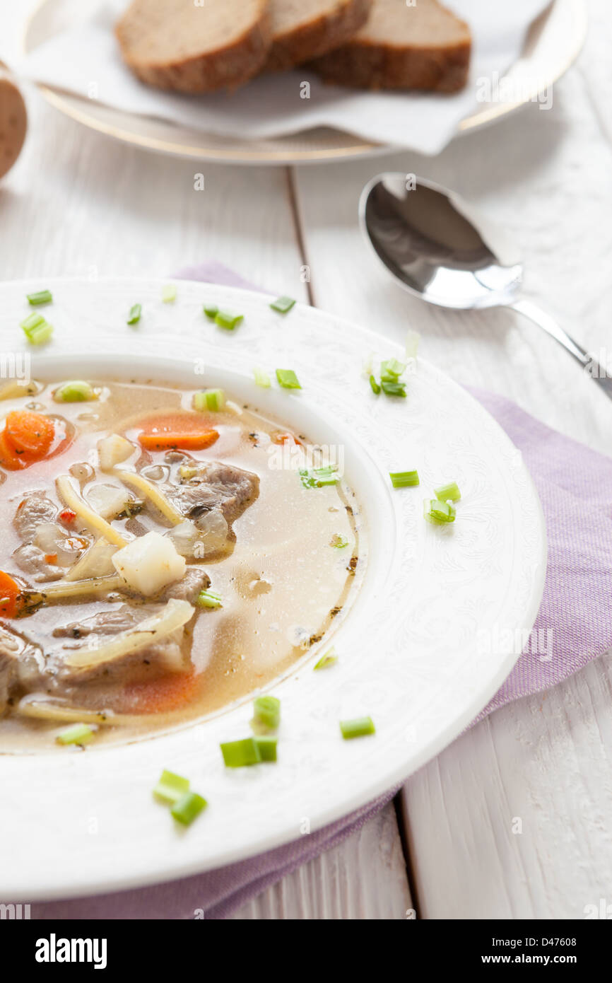 fragrant soup with pork, noodles and vegetables, closeup Stock Photo ...