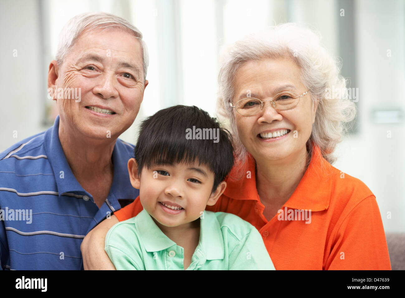 Asian Grandparents Playing With Grandchildren