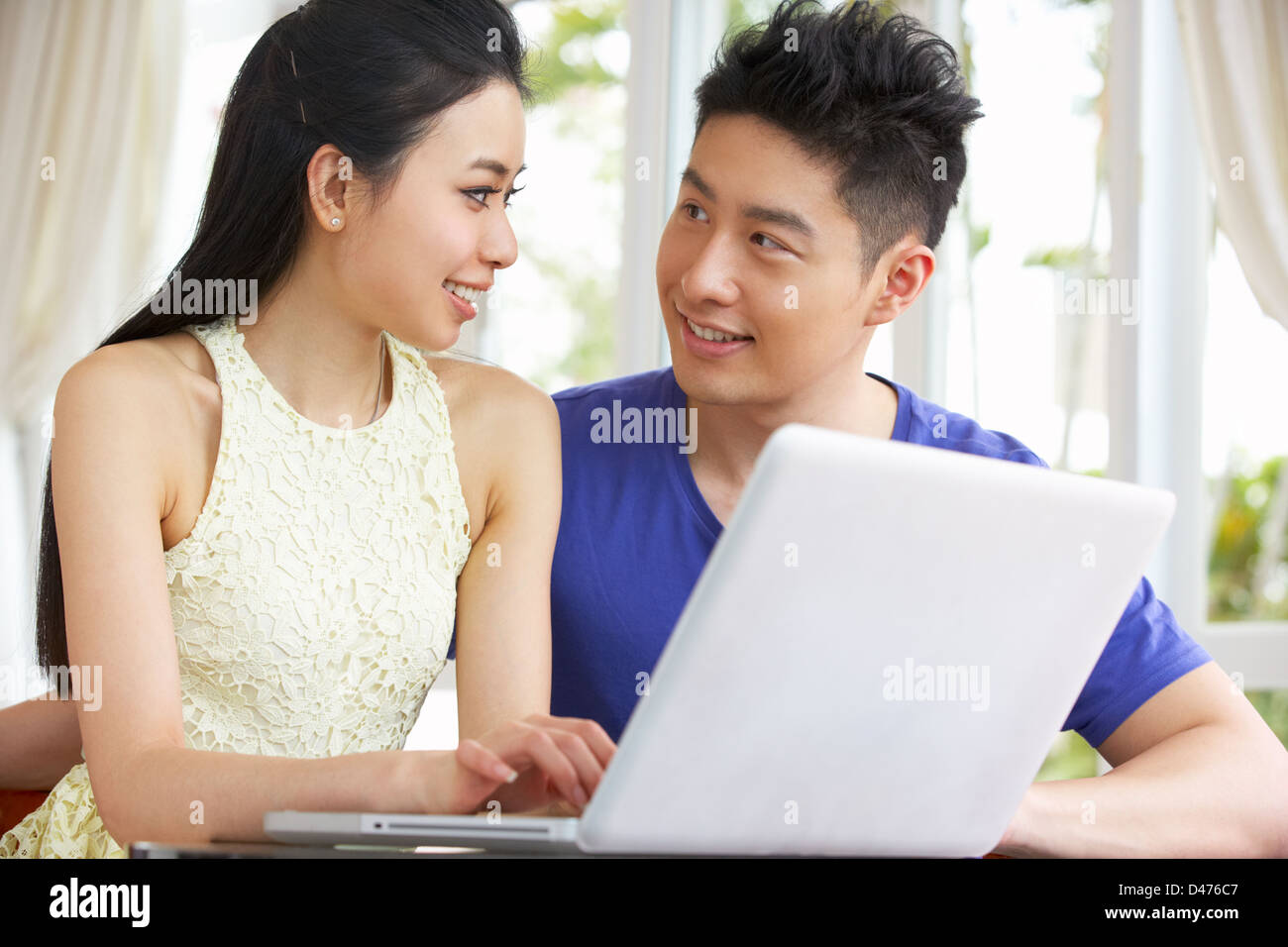 Asian young woman on desk hi-res stock photography and images - Alamy