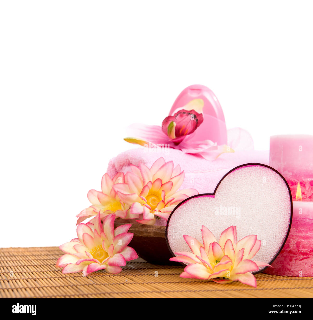 Spa setting in pink tone isolated in white Stock Photo - Alamy