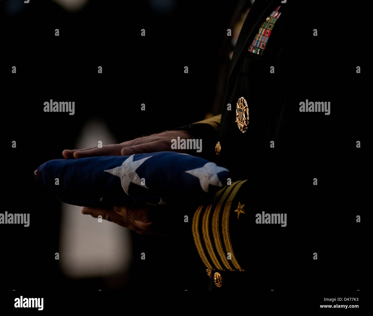 Capt. Bruce H. Lindsey of USS Carl Vinson oversees a burial at sea for ...