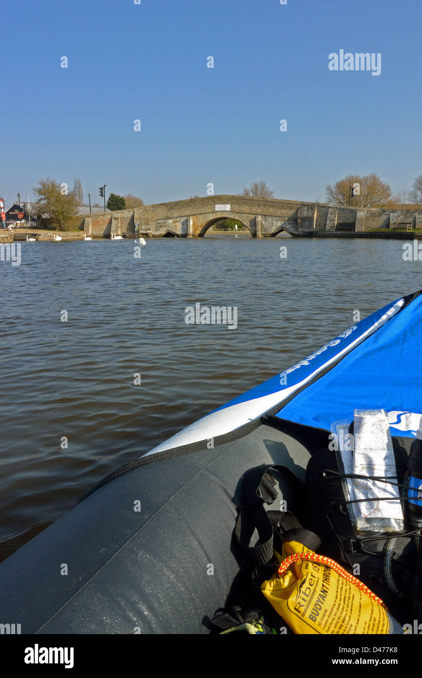 Inflatable canoe on the river Thurne, Norfolk, with Potter Heigham ...