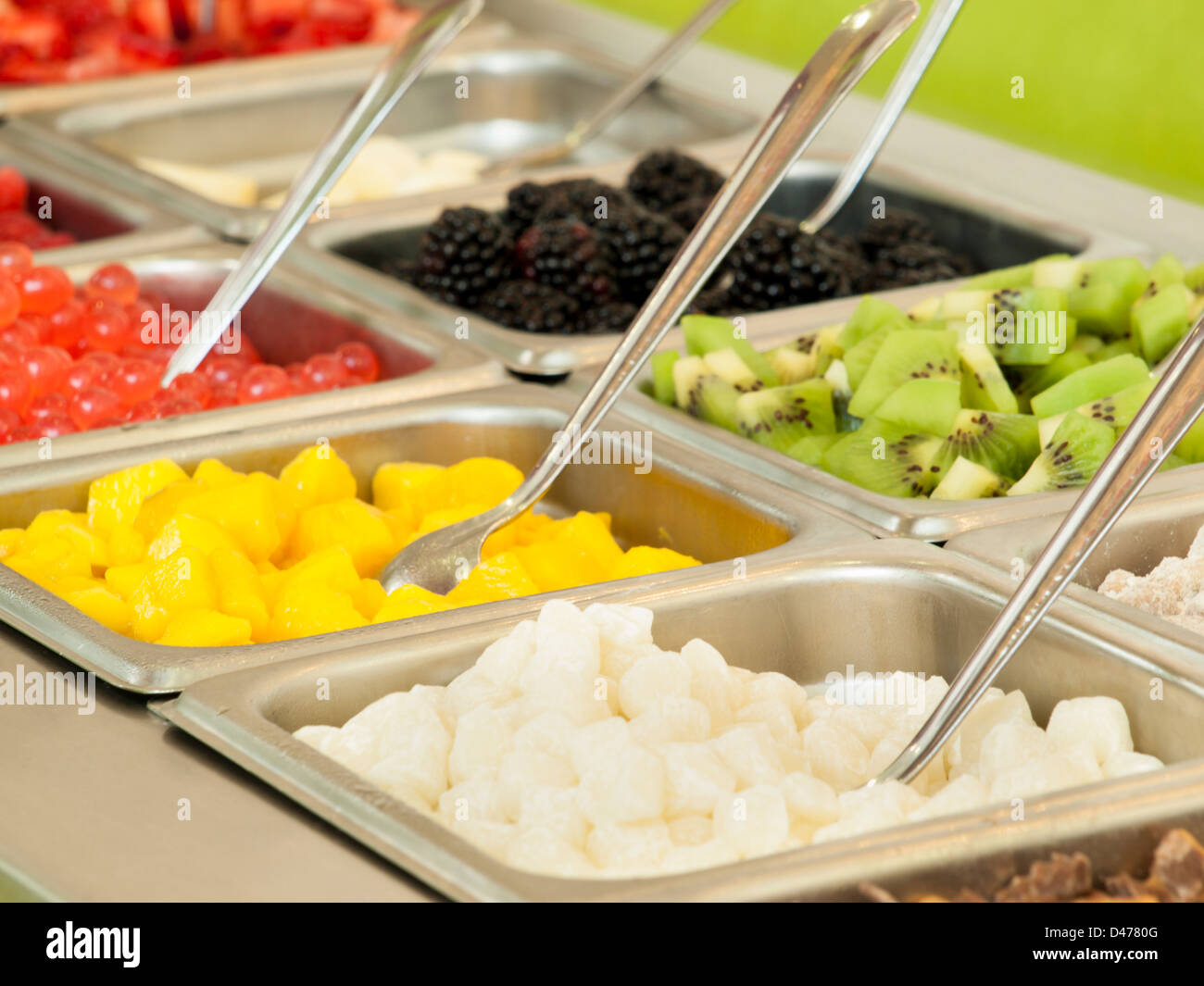 ‎Frozen yogurt toppings bar. Yogurt toppings ranging from fresh fruits ...