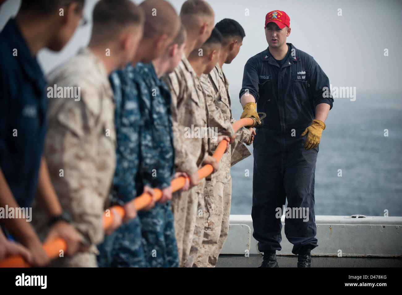 Fire hose handling techniques hi-res stock photography and images - Alamy
