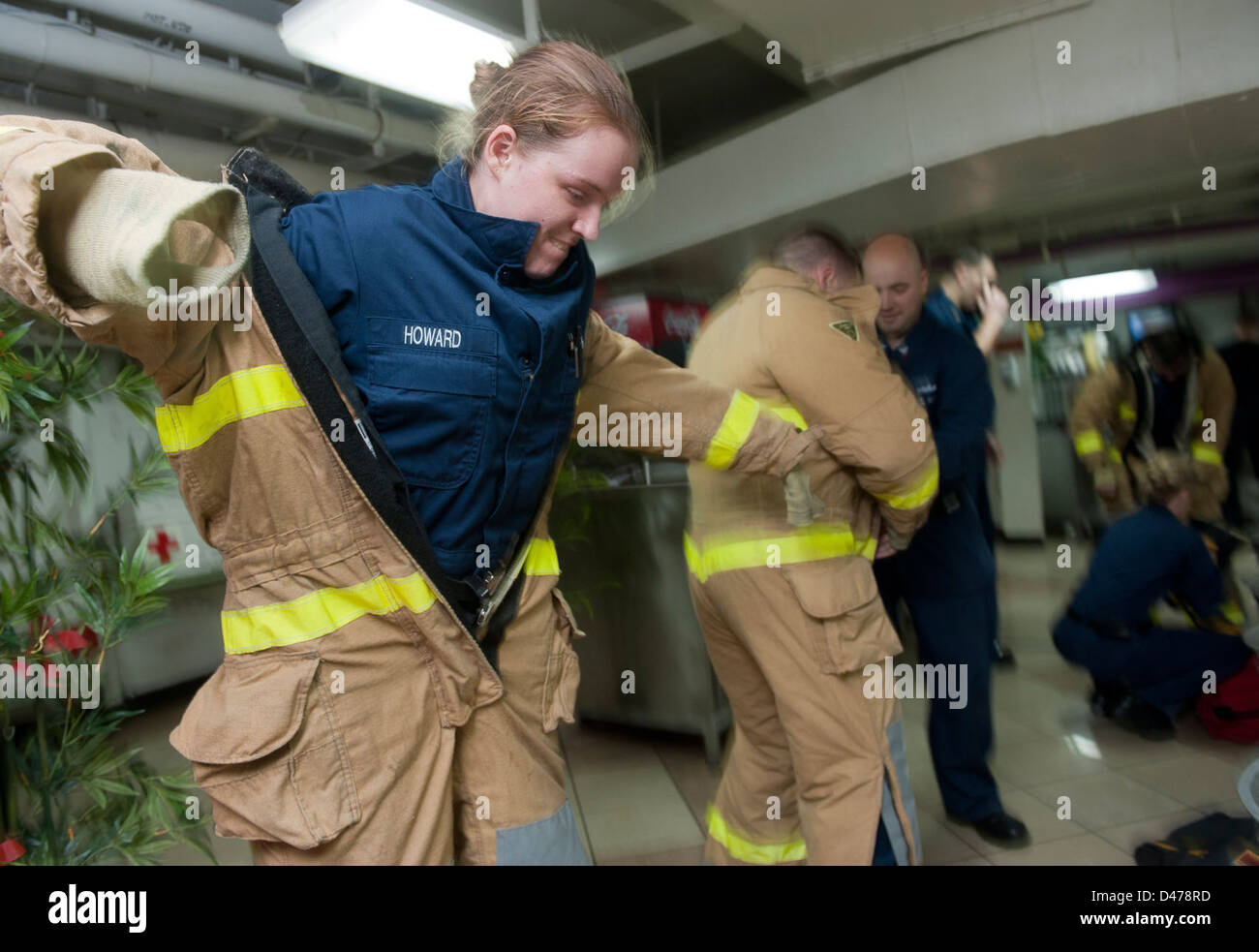A Sailor aboard a U.S. Navy ship in the Indian Ocean wears a complete ...