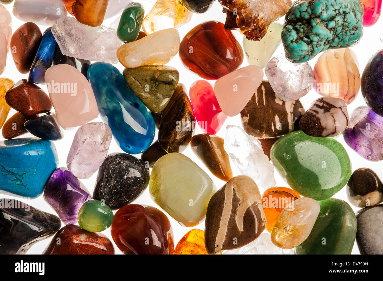 Assortment of polished semi-precious gem stones shot in the studio ...