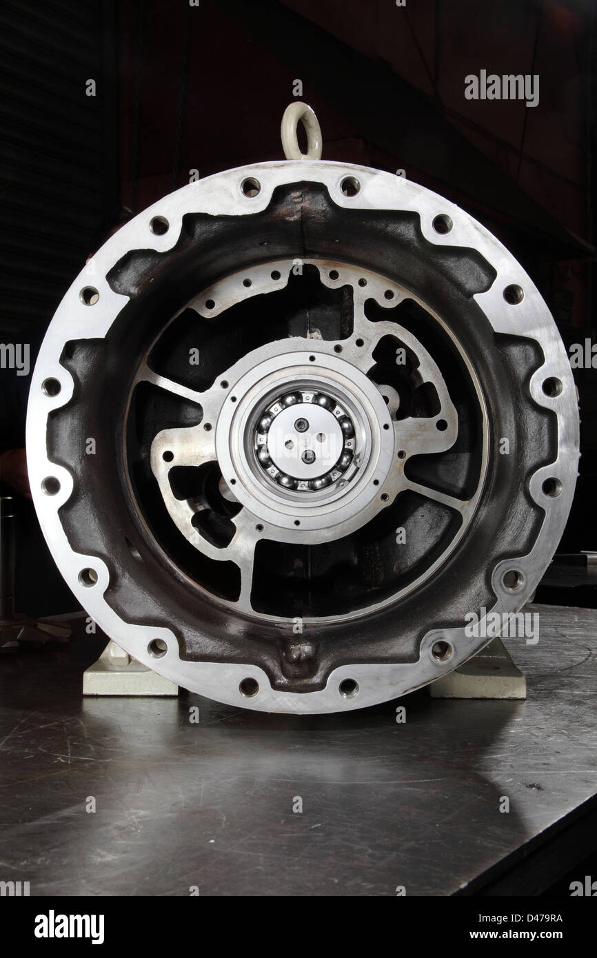 An industrial compressor during assembly showing a cross-section of the ...