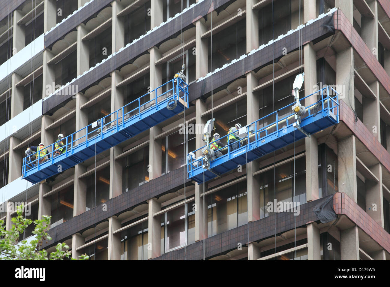 Suspended cradle hi-res stock photography and images - Alamy