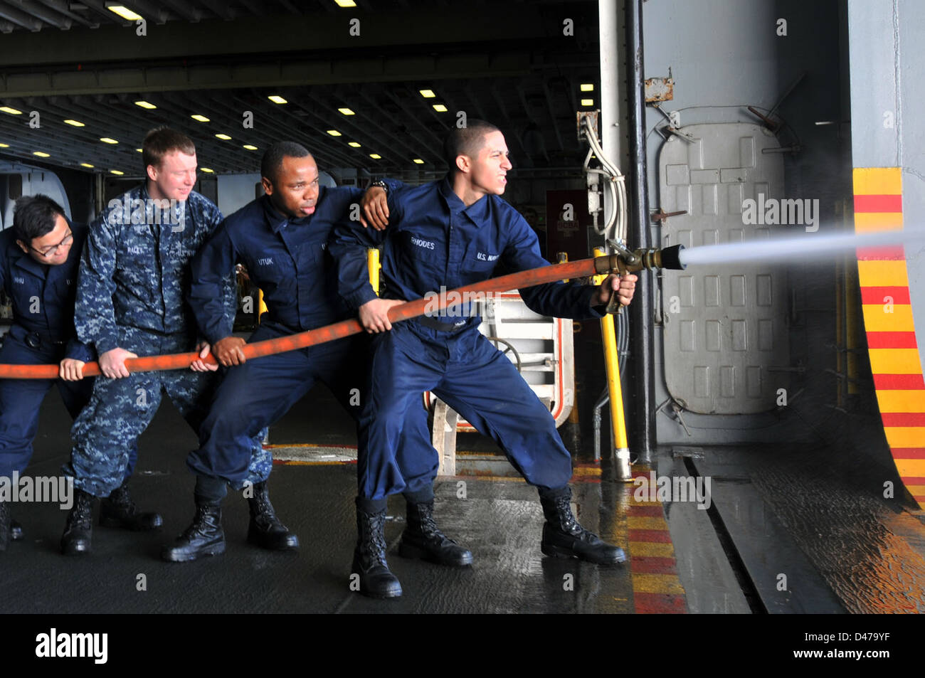 Fire hose handling techniques hi-res stock photography and images - Alamy