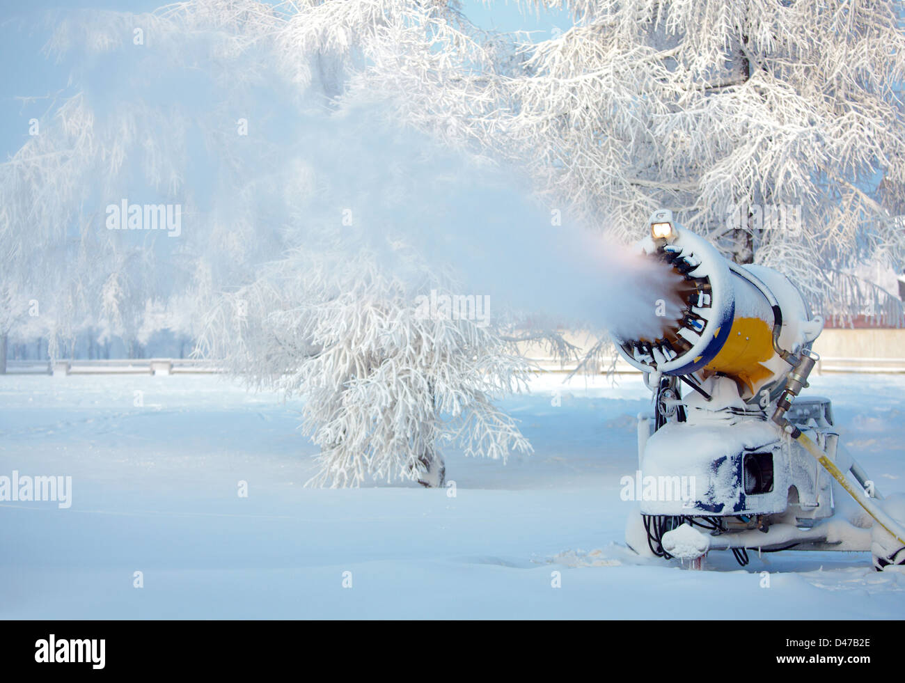Working snow cannon on beautiful winter day Stock Photo - Alamy