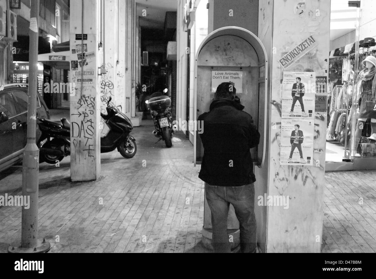 Phone booth night man hi-res stock photography and images - Alamy