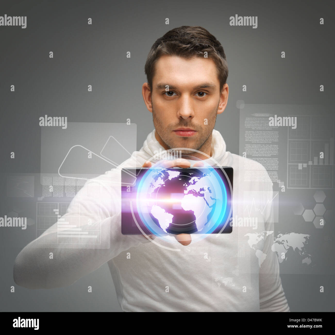 man with tablet pc and virtual screens Stock Photo - Alamy