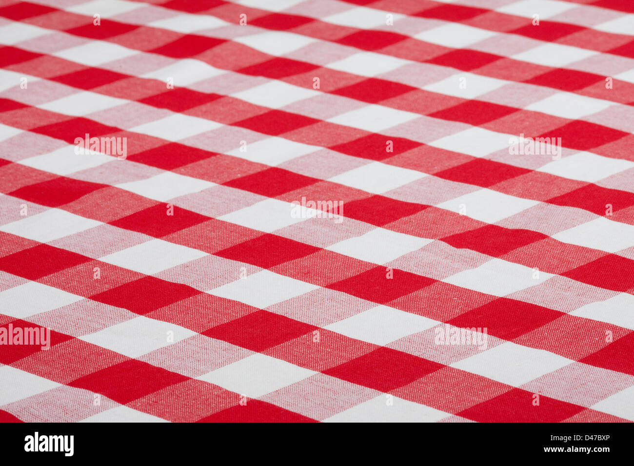 red checked fabric tablecloth Stock Photo - Alamy