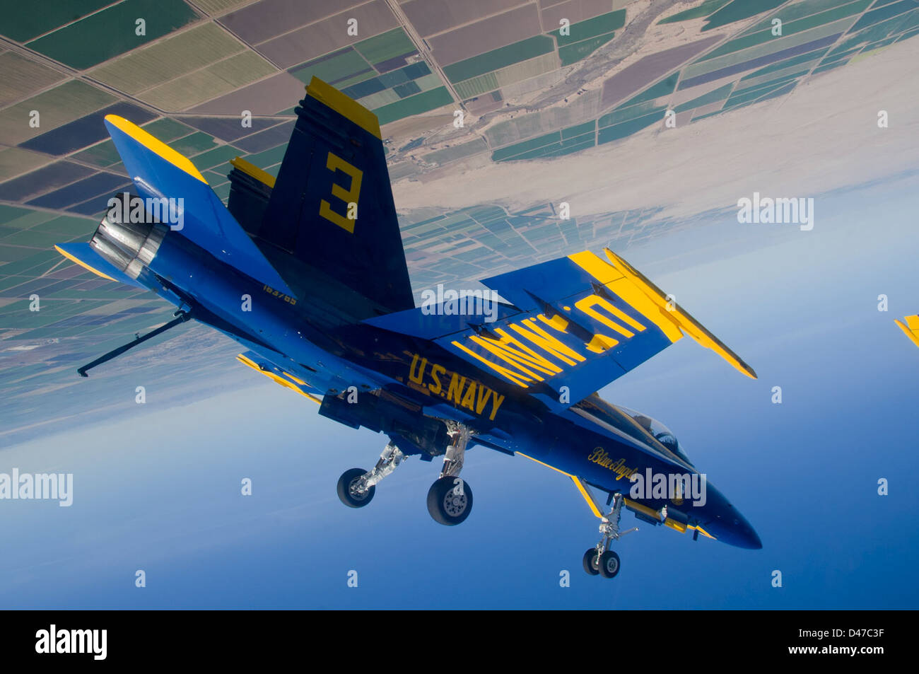 A Blue Angels pilot Blue Angels, performs a “diamond dirty loop.” Stock ...